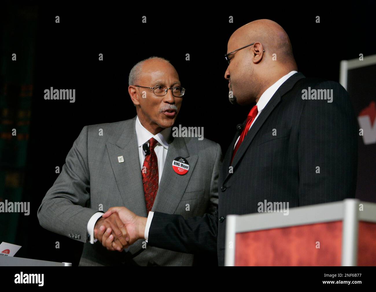 Detroit Mayor Ken Cockrel Jr., right, and Dave Bing shake hands to ...