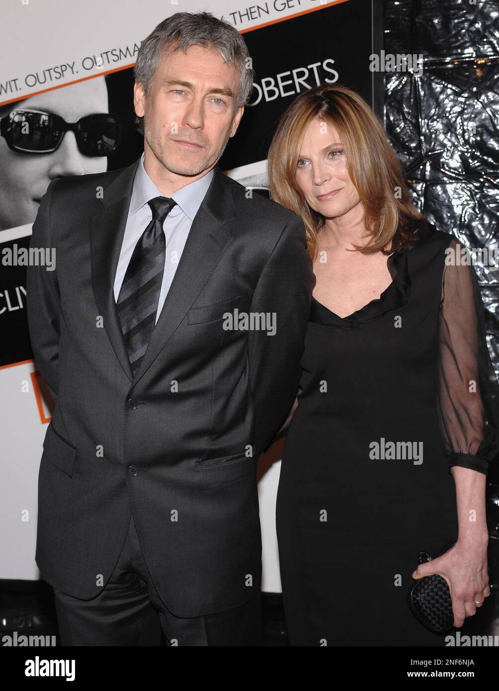 Director Tony Gilroy and wife Susan attend the premiere for 'Duplicity ...