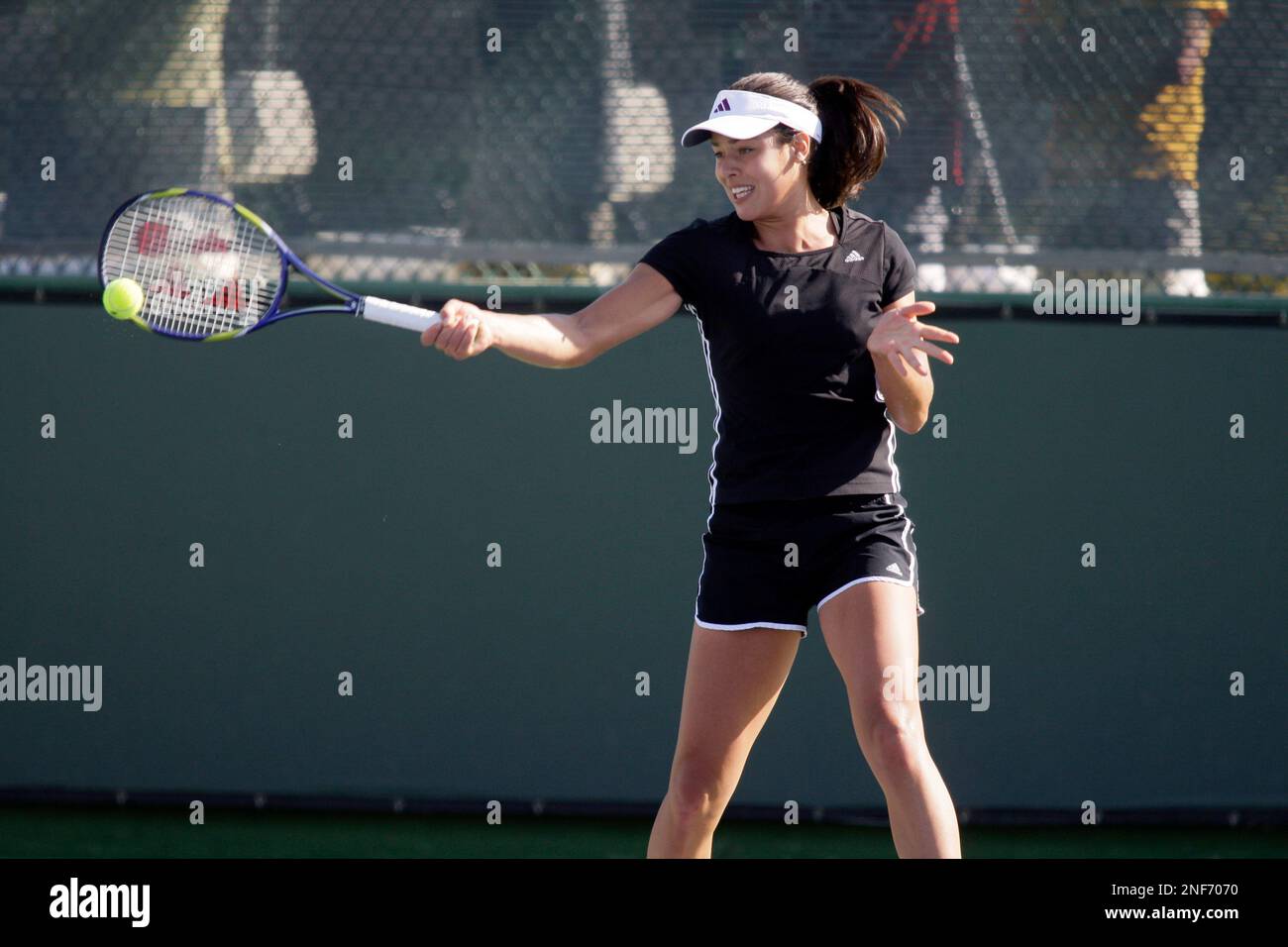 Ana Ivanovic, of Serbia, returns a volley during tennis practice for ...