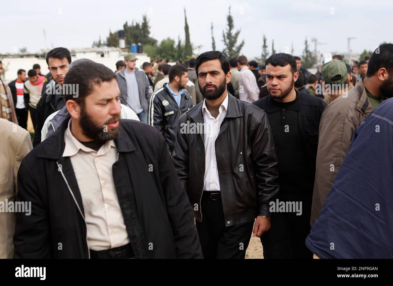 Hamas legislator Mushir al-Masri, center, attends the funeral of four ...