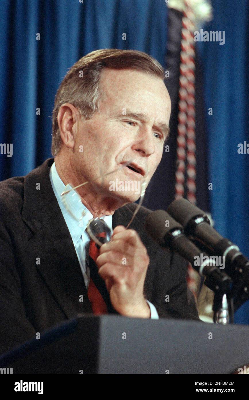 President George Bush listens to a question during a news conference at ...