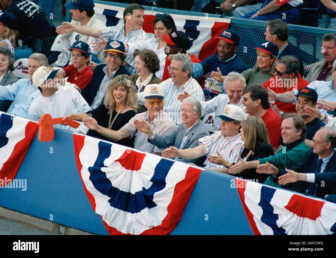 Actress Jane Fonda, left center, Braves owner Ted Turner, center, and ...