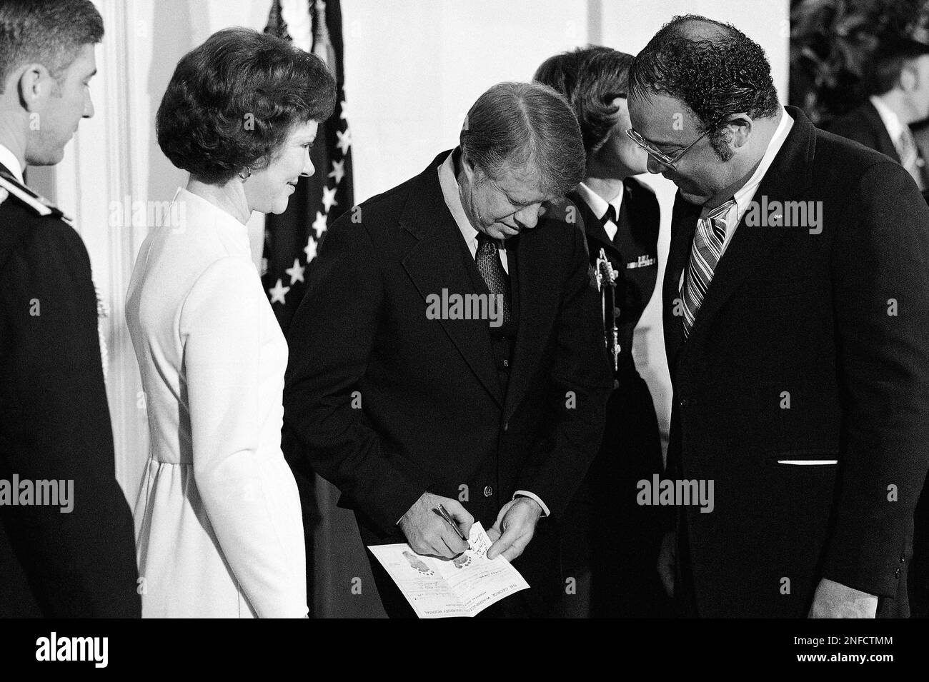 President Jimmy Carter signs the birth certificate of Rep. Charles ...