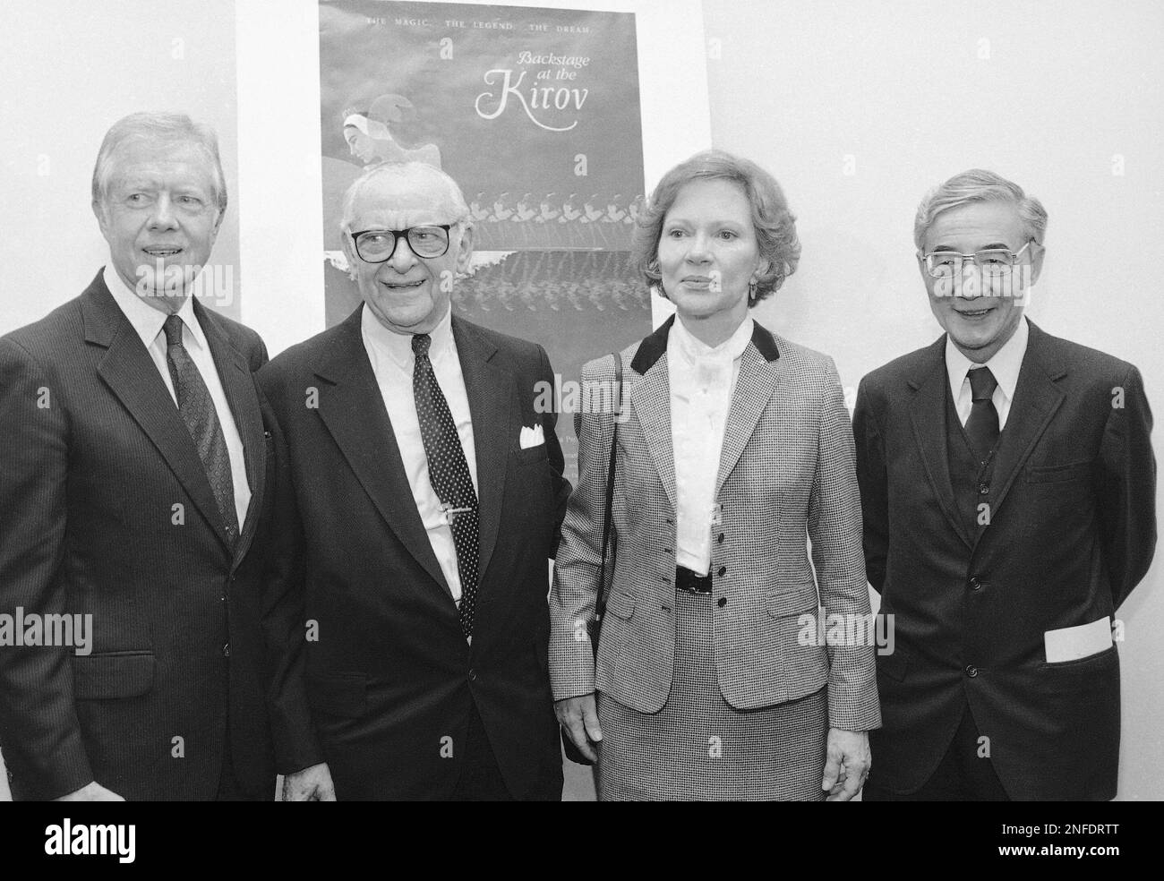 Former Pres. Jimmy Carter, left, poses with Armand Hammer, center, and ...