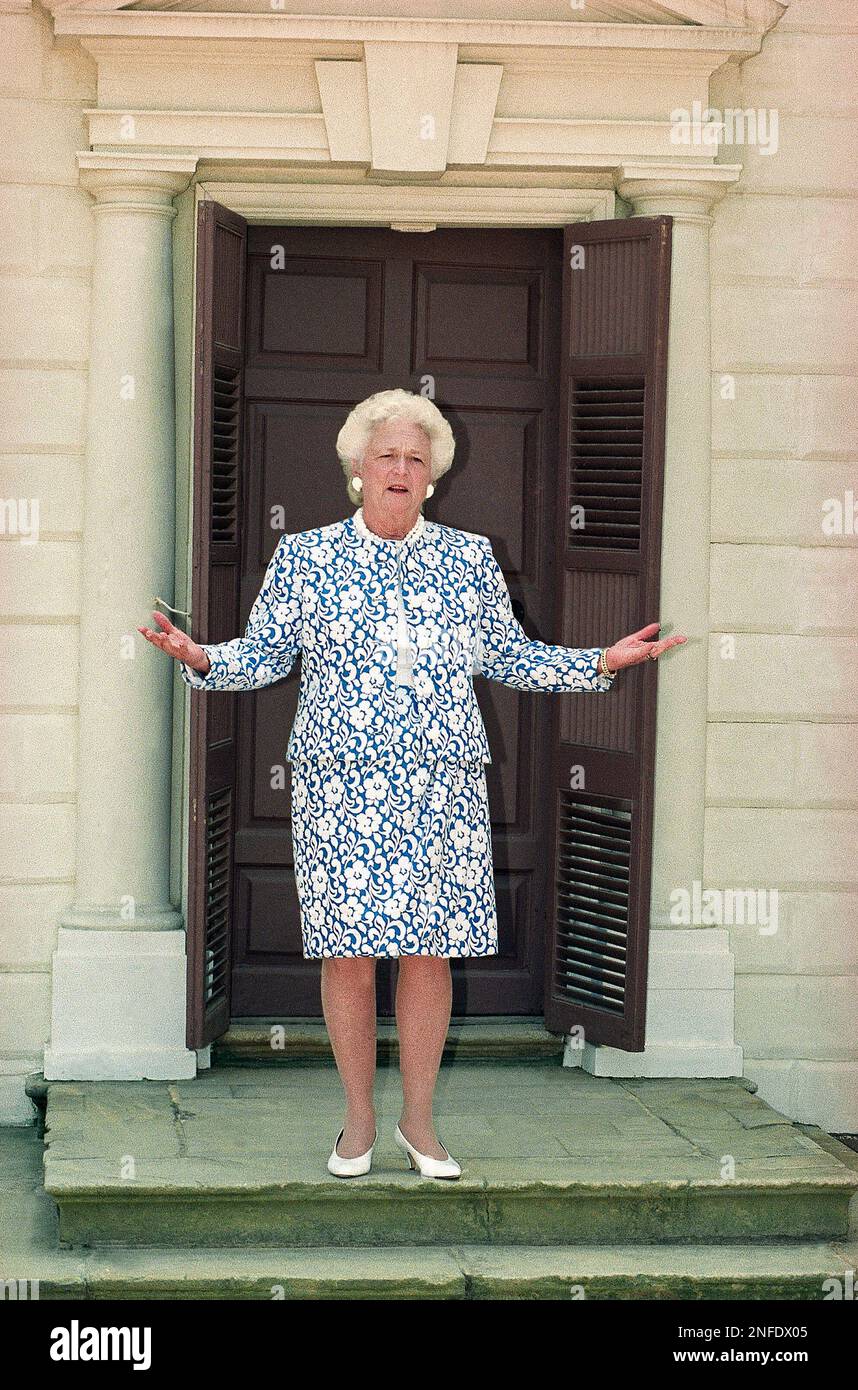 First lady Barbara Bush stands in the doorway of the historic home of ...