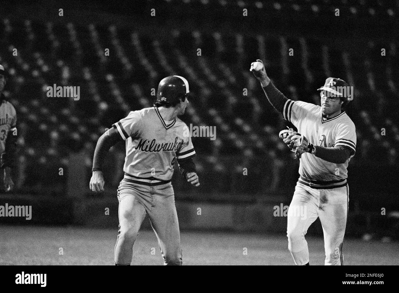 Milwaukee Brewers second baseman Paul Molitor, left, gets trapped ...