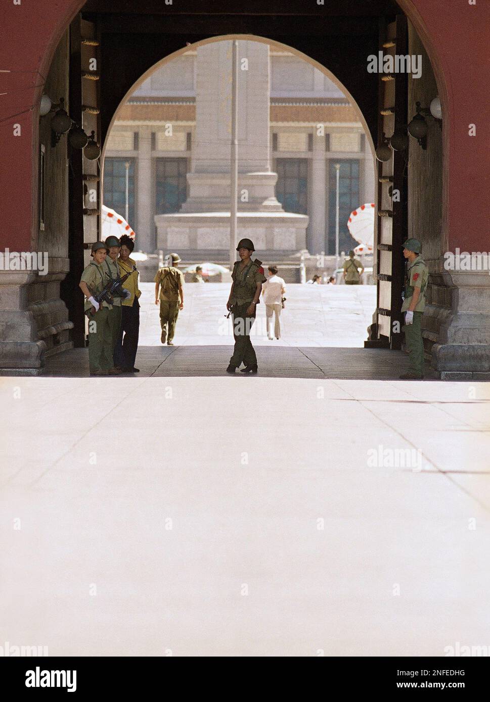 People's Liberation Army soldiers guard the main gate of Tiananmen, the ...
