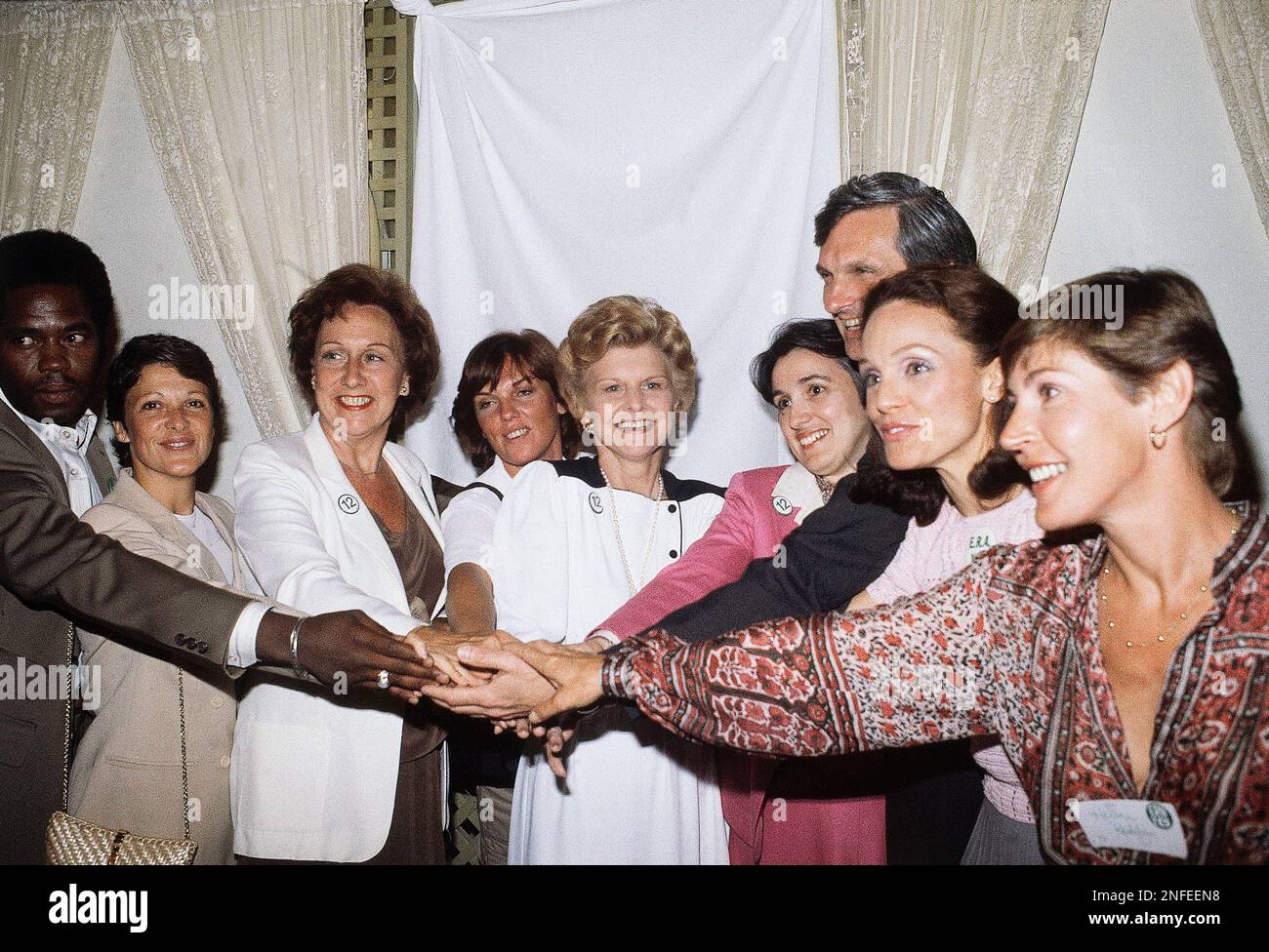 First lady Betty Ford, center, poses at an ERA NOW luncheon, June 11 ...