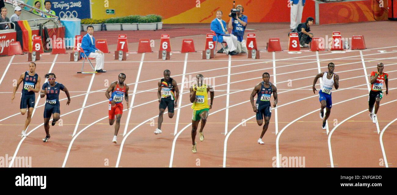 From left, United States' Wallace Spearmon, United States' Walter Dix ...