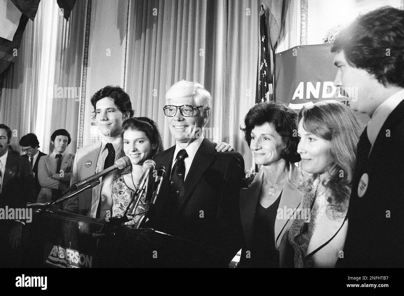 Rep. John B. Anderson is flanked by his family members as he faces ...