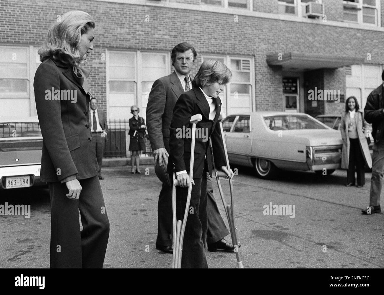 Edward Kennedy Jr. walks on crutches as he leaves Georgetown hospital ...