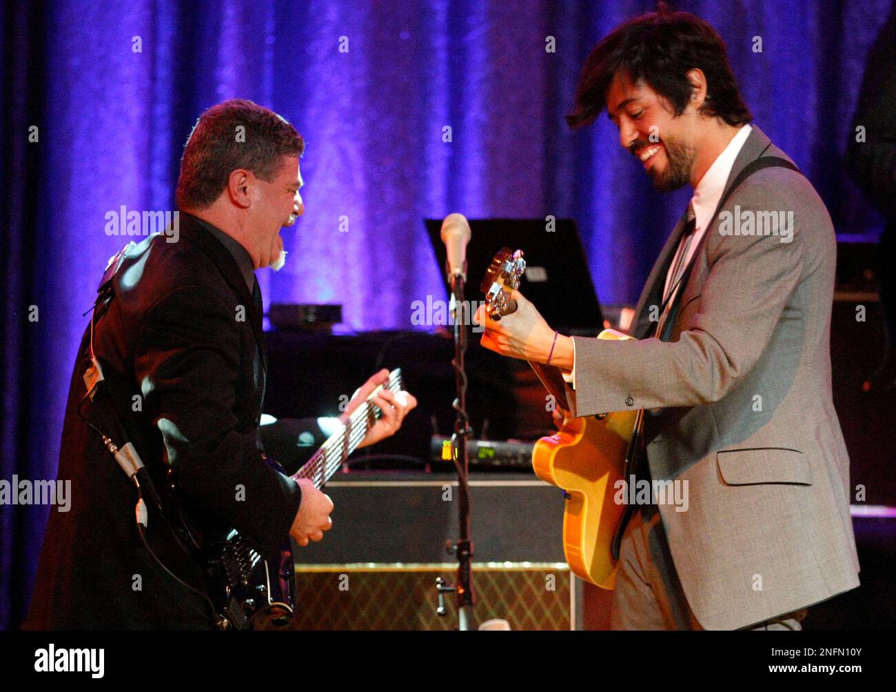 Composer, producer, and musician Gustavo Santaolalla, left, performs ...
