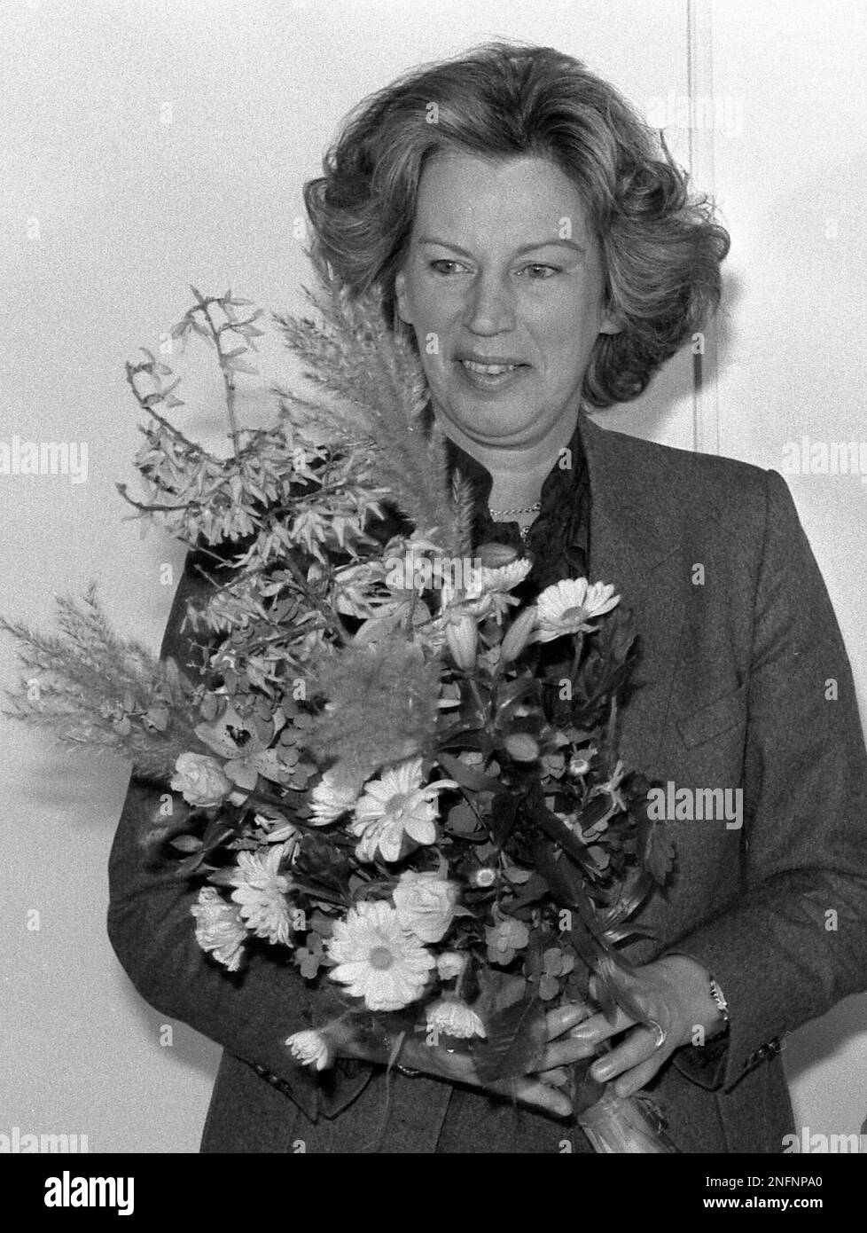 Mildred Scheel, president of the German Cancer Society, holds a bunch ...