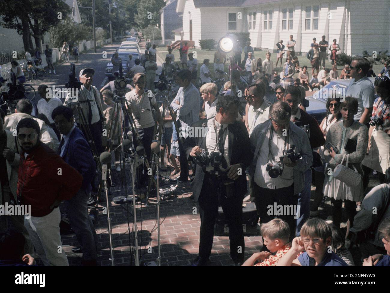 View of photographers taking pictures, with other press and spectators ...