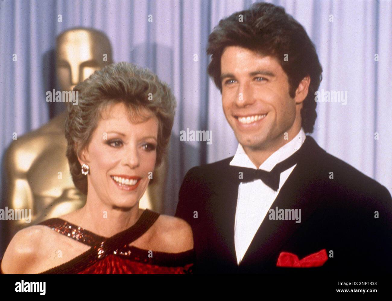 Comedian Carol Burnett and actor John Travolta are shown at the 55th ...