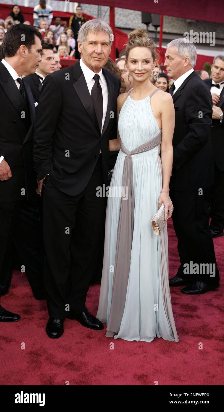 Actor Harrison Ford and actress Calista Flockhart arrive at the 80th ...