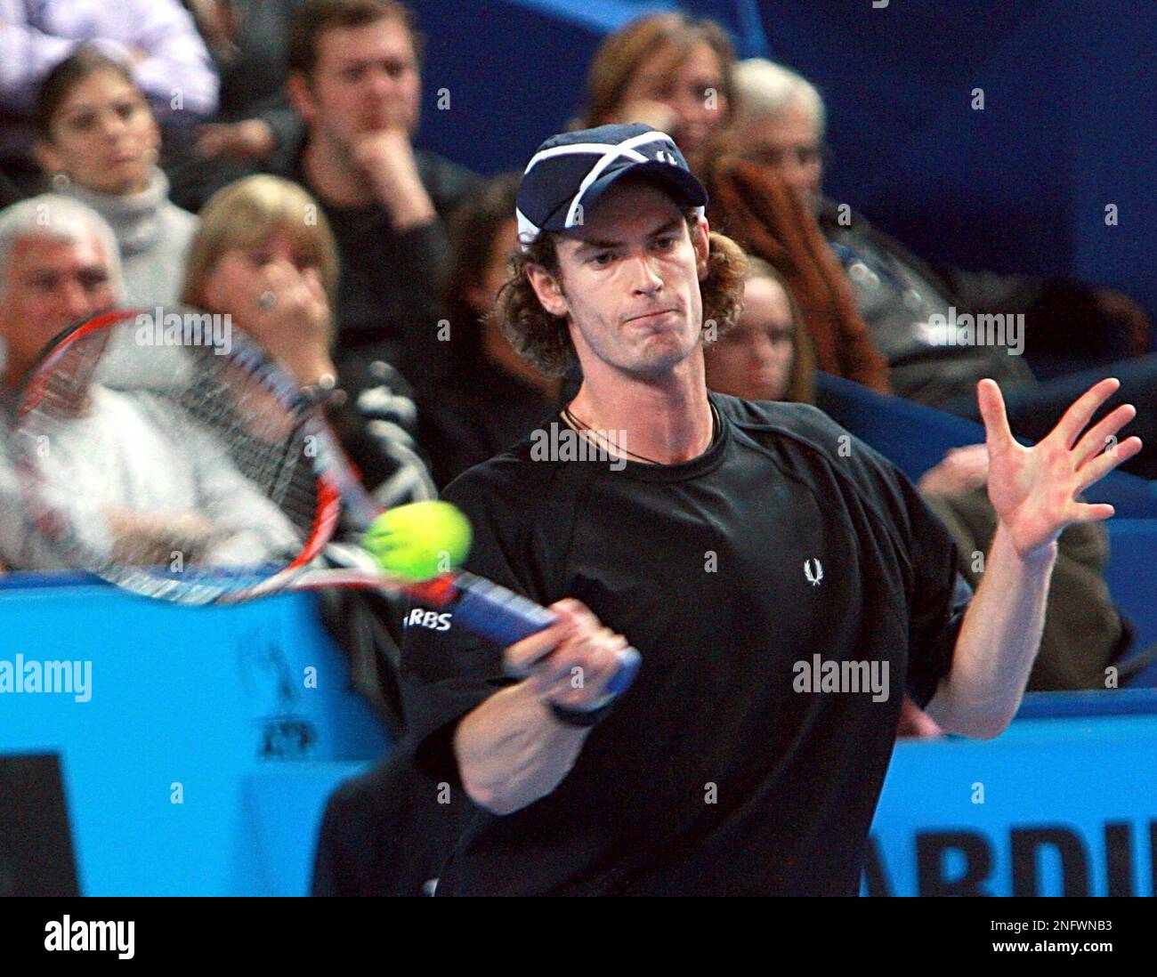 Britain's Andy Murray returns to Croatia's Mario Ancic during their ...