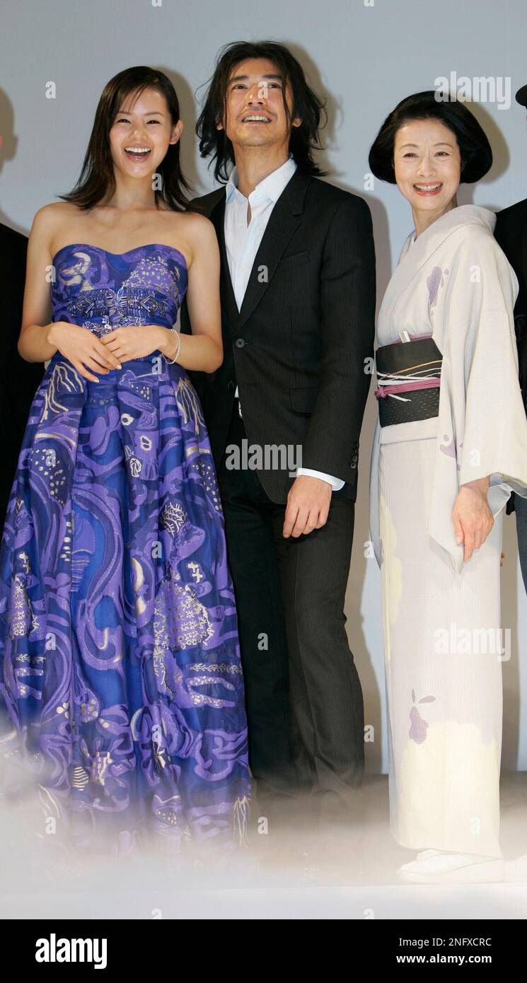 Japanese actor Takeshi Kaneshiro, center, actress Manani Konishi, left ...