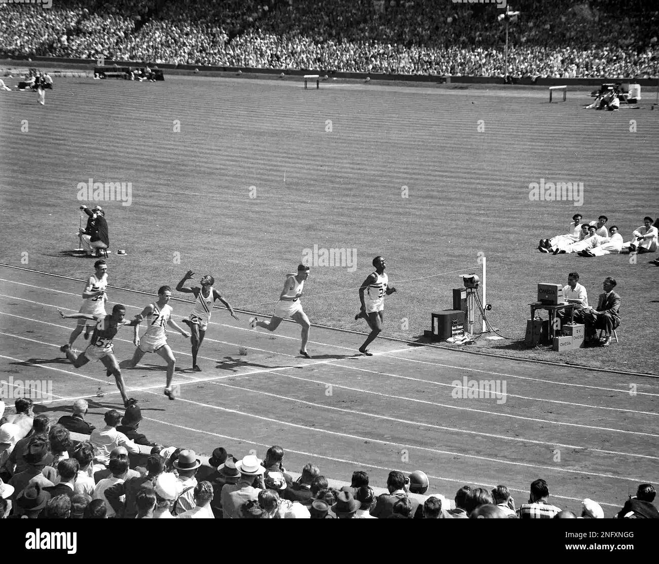 American athlete Mel Patton, third from left, wins the 100-metre ...