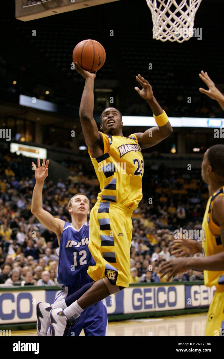 Marquette's Wesley Matthews (23) puts up a shot in front of IPFW's Ben ...
