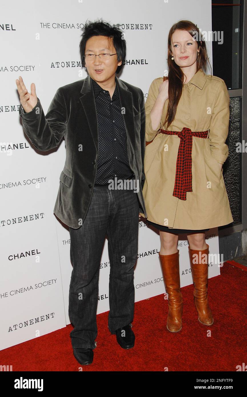 Actor Masi Oka and date Lynn Bjornen attend the "Atonement" premiere ...