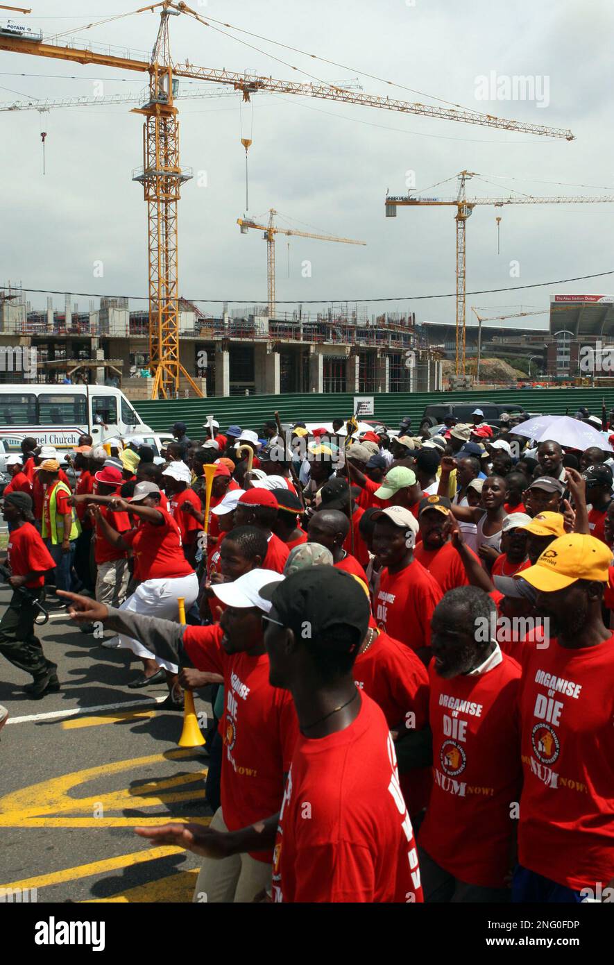 Union members protest outside the Moses Mabhida Stadium under ...