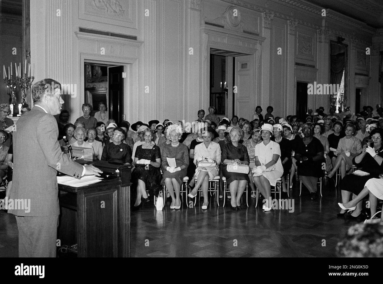 President John Kennedy, speaking to 300 members of Women's ...