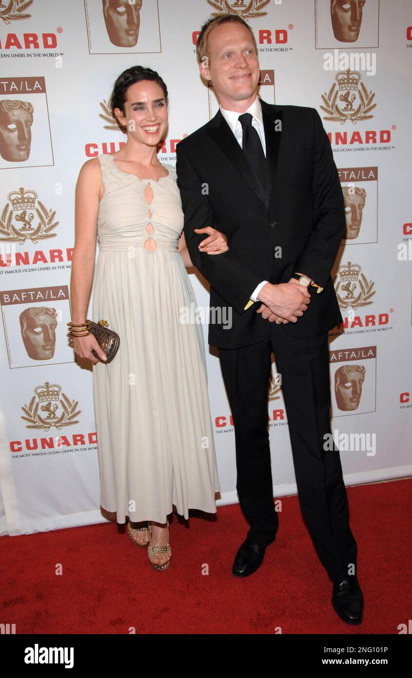 Actress Jennifer Connelly, left, and husband, actor Paul Bettany, right ...