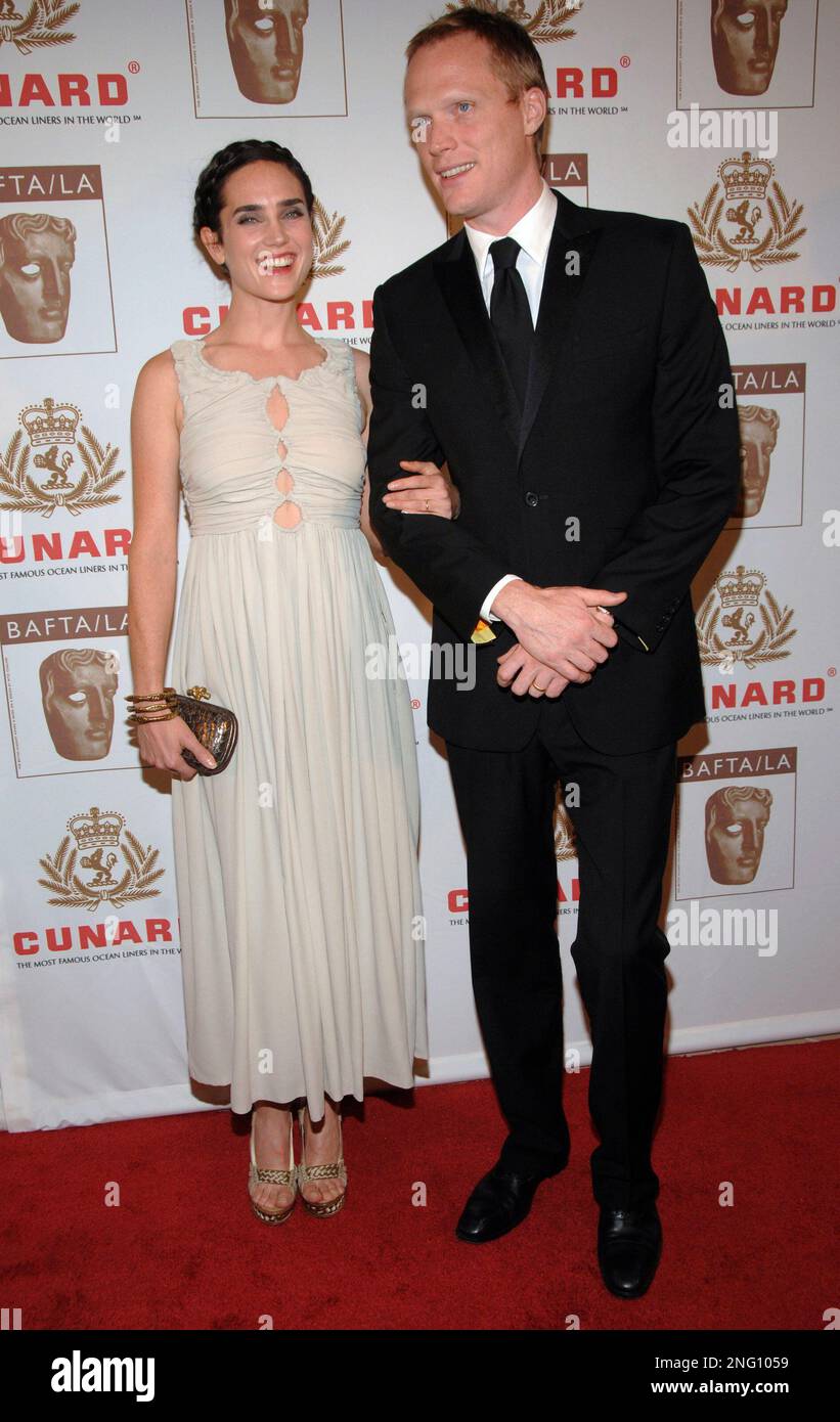 Actress Jennifer Connelly, left, and husband, actor Paul Bettany, right ...