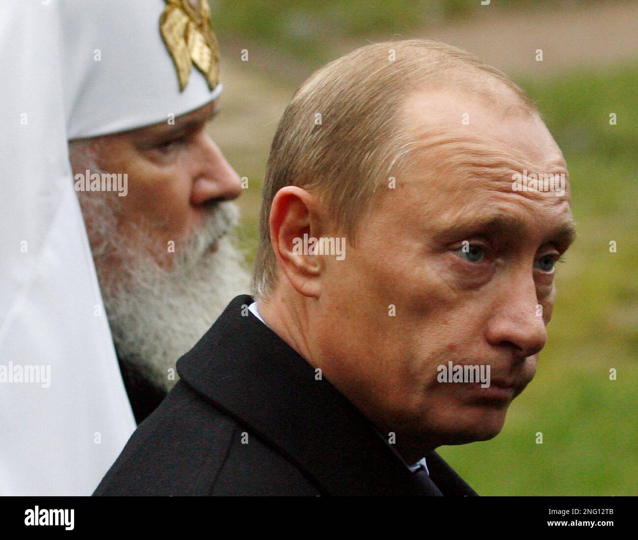 ** TO ARCHIVES ** Russian President Vladimir Putin, right, and Russian ...