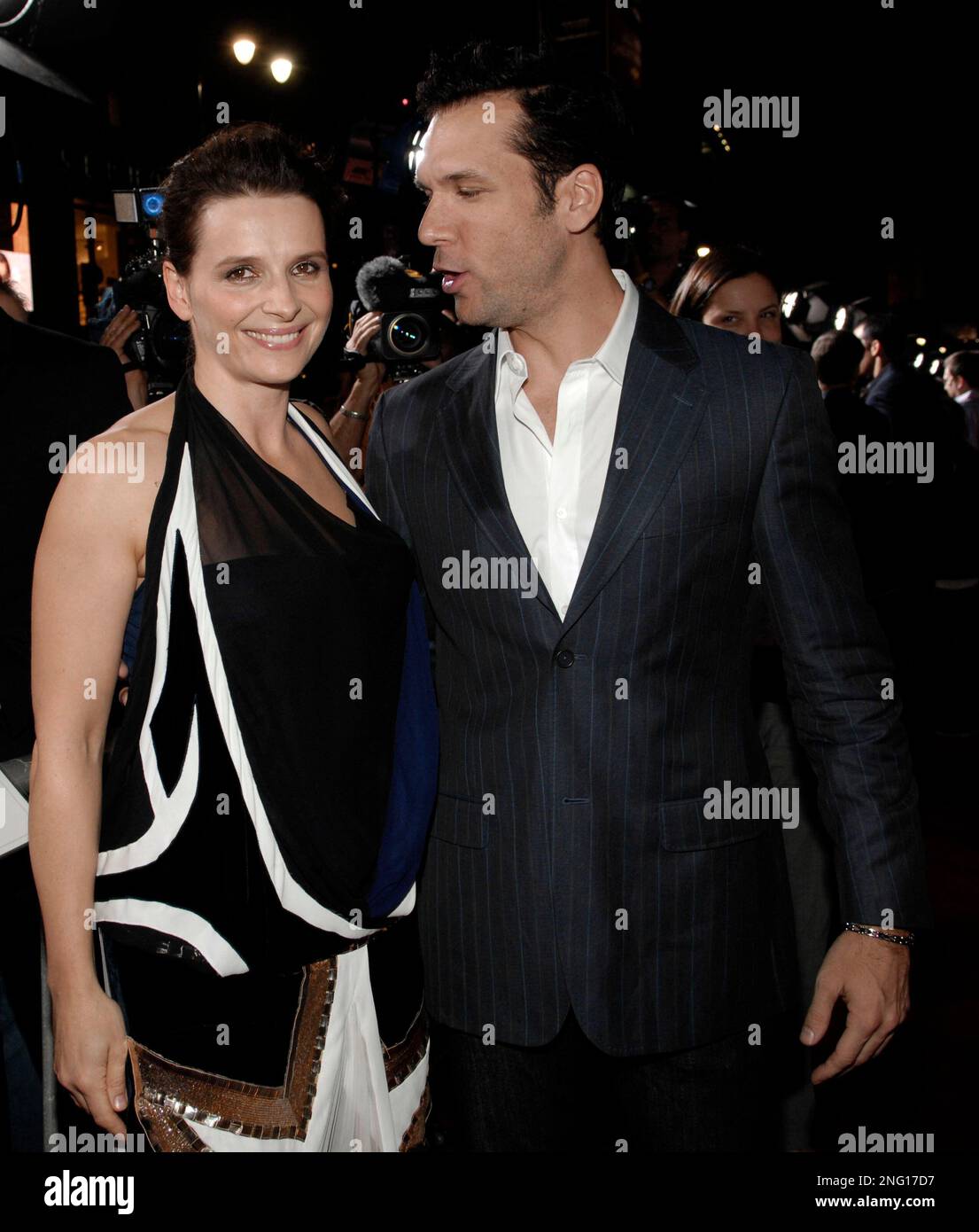 Actors Juliette Binoche, left, and Dane Cook arrive at the world ...