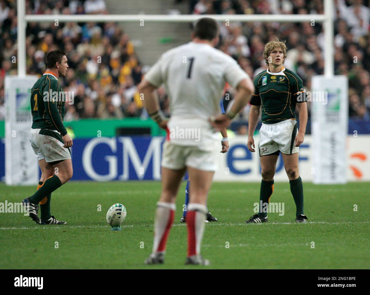 South Africa's Francois Steyn, right, prepares to kick the ball as ...