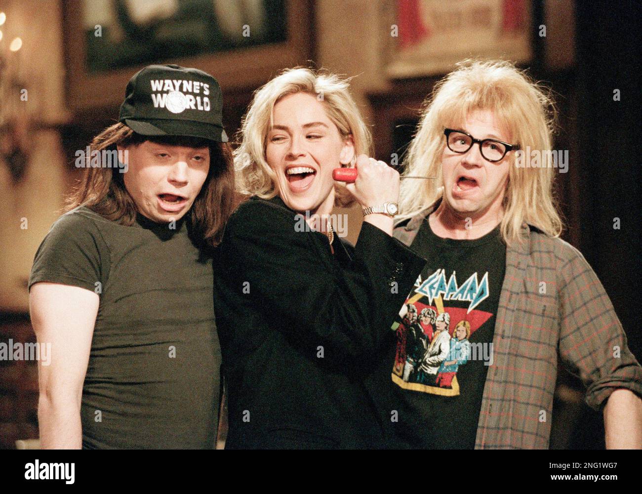 Sharon Stone holds an ice pick up to Dana Carvey's, as Garth, face, as ...