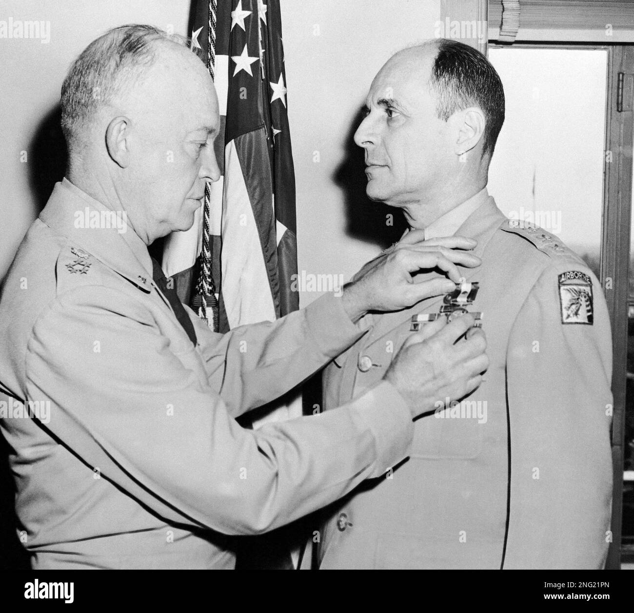 General of the Army Dwight D. Eisenhower presents an oak leaf cluster ...