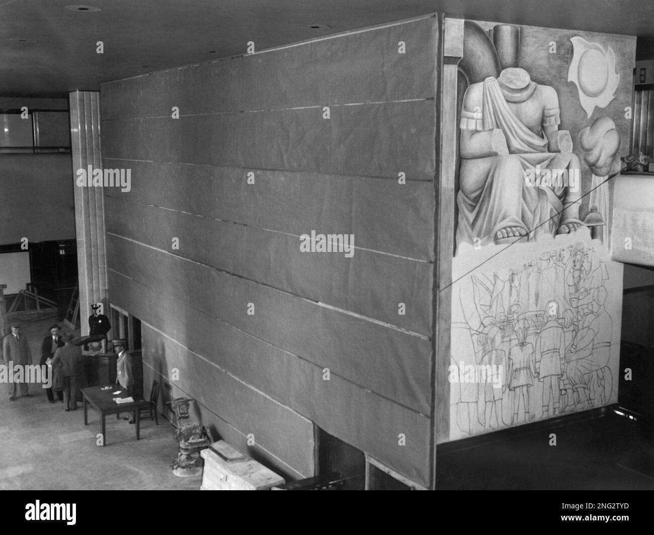 A screen covering the offending portion of Diego Rivera's mural in the ...