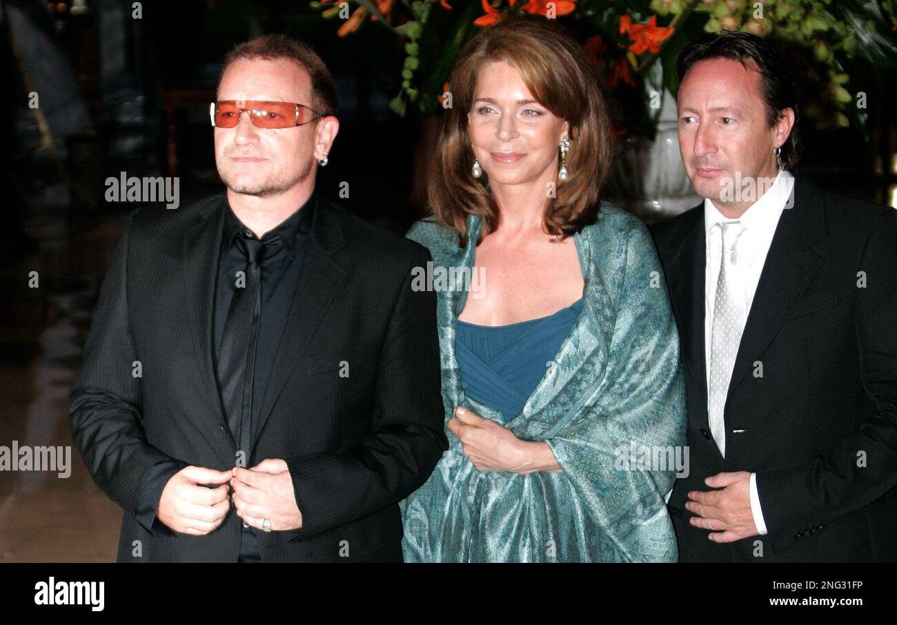 Left to right, Irish singer Bono, from the band U2, Queen Noor of ...