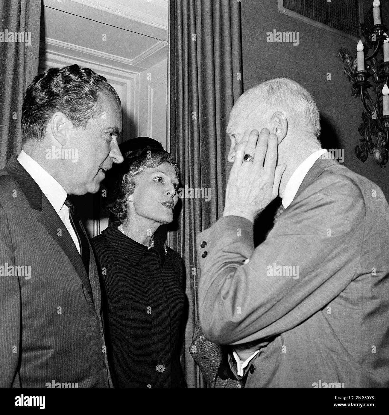 Former President Dwight D. Eisenhower chats with Richard Nixon and his ...