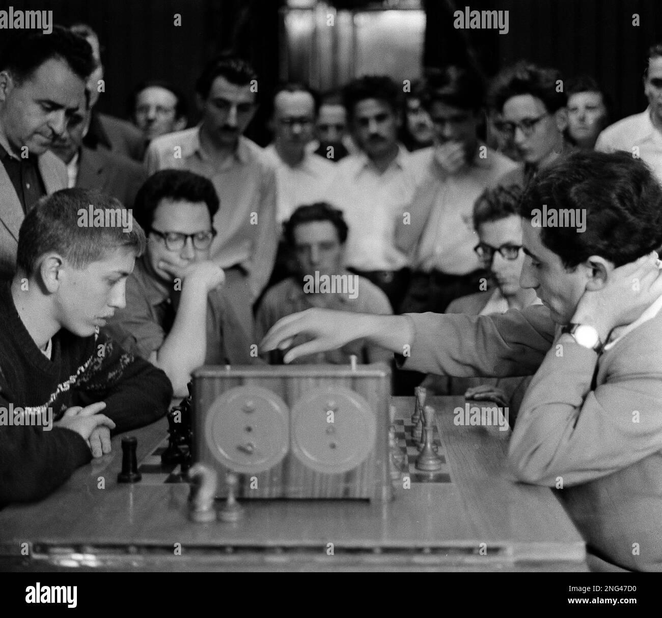 Fifteen-year-old chess star Bobby Fischer of Brooklyn, N.Y., left, and ...