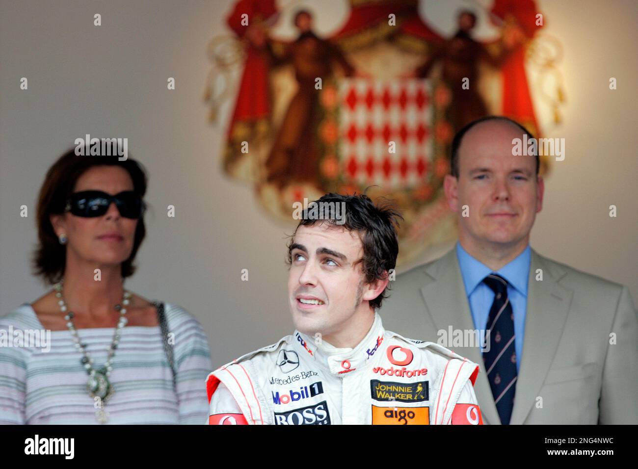McLaren Formula One driver Fernando Alonso of Spain, foreground, looks ...
