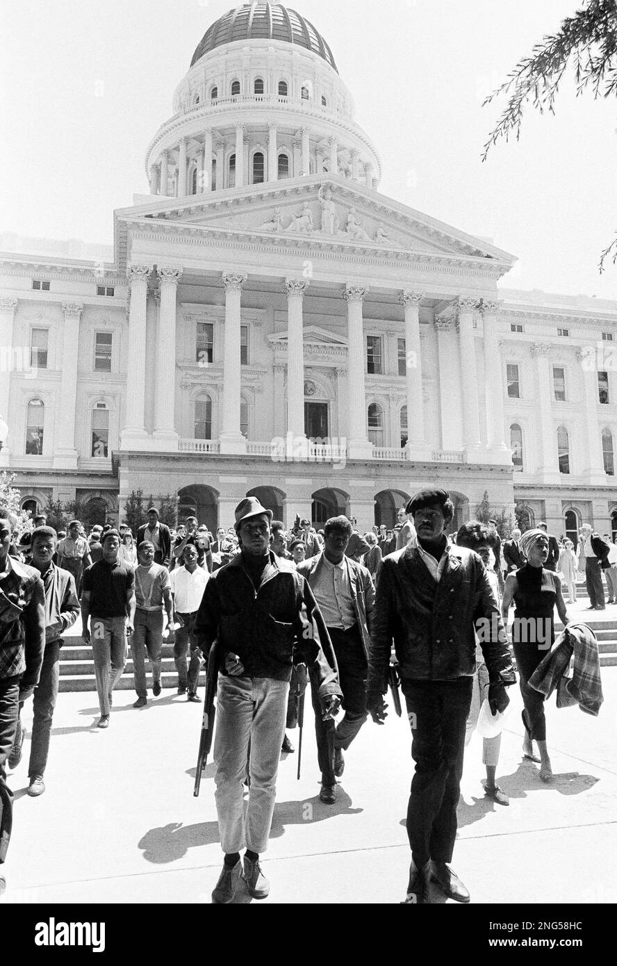 Armed members of the Black Panther Party leave the Capitol in ...