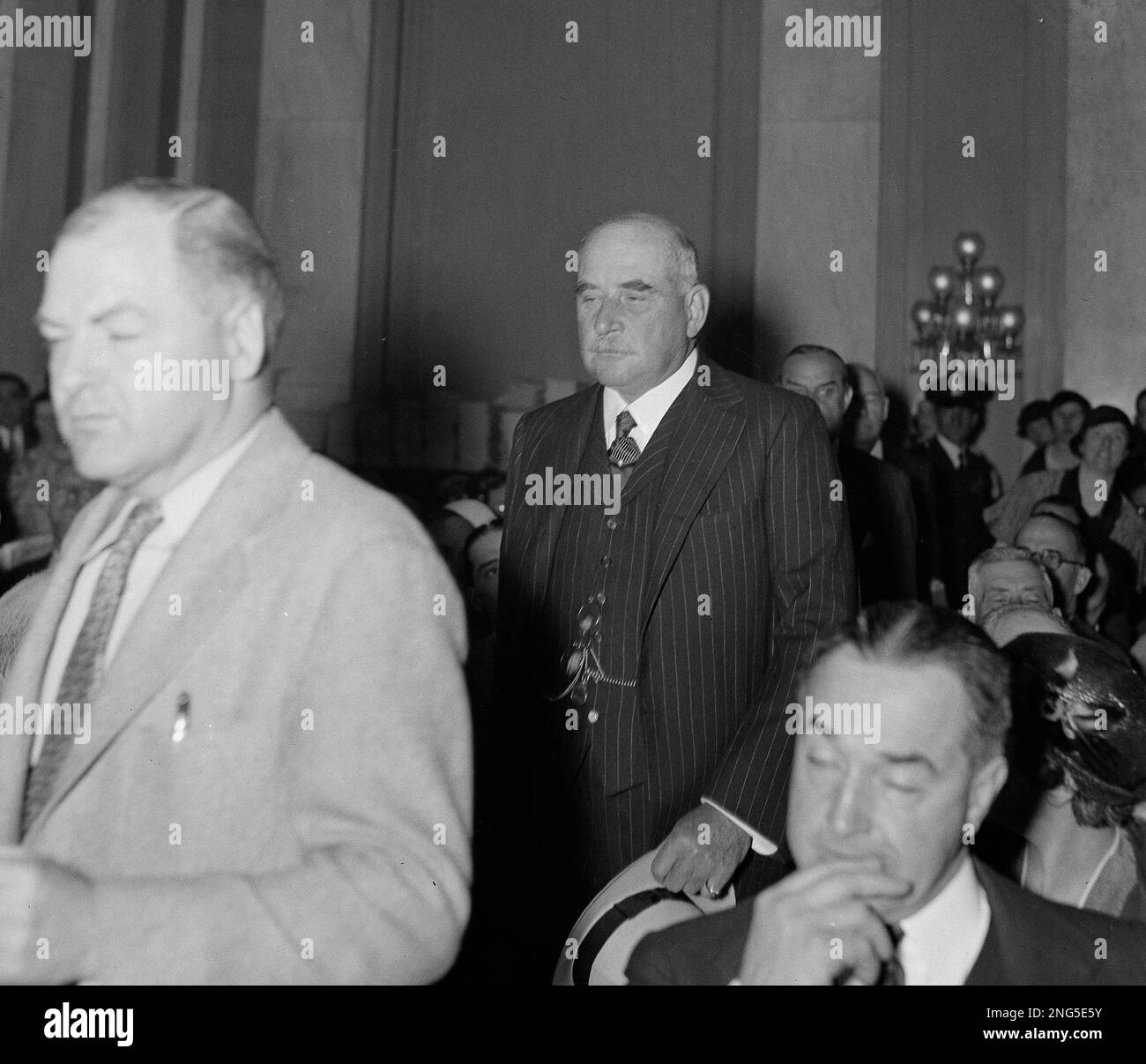 Appearing at ease, banker and industrialist J.P. Morgan is shown ...