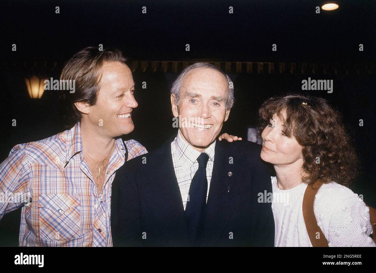 Henry Fonda (center) seen on his 75th birthday, May 16, 1980 with son ...