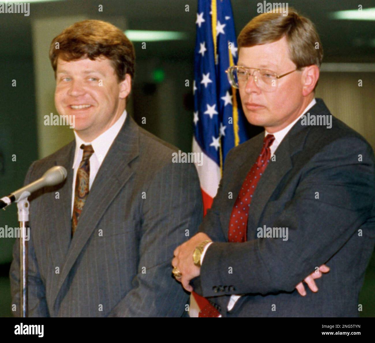 Los Angeles police officer Laurence Powell, left, smiles as he and his ...