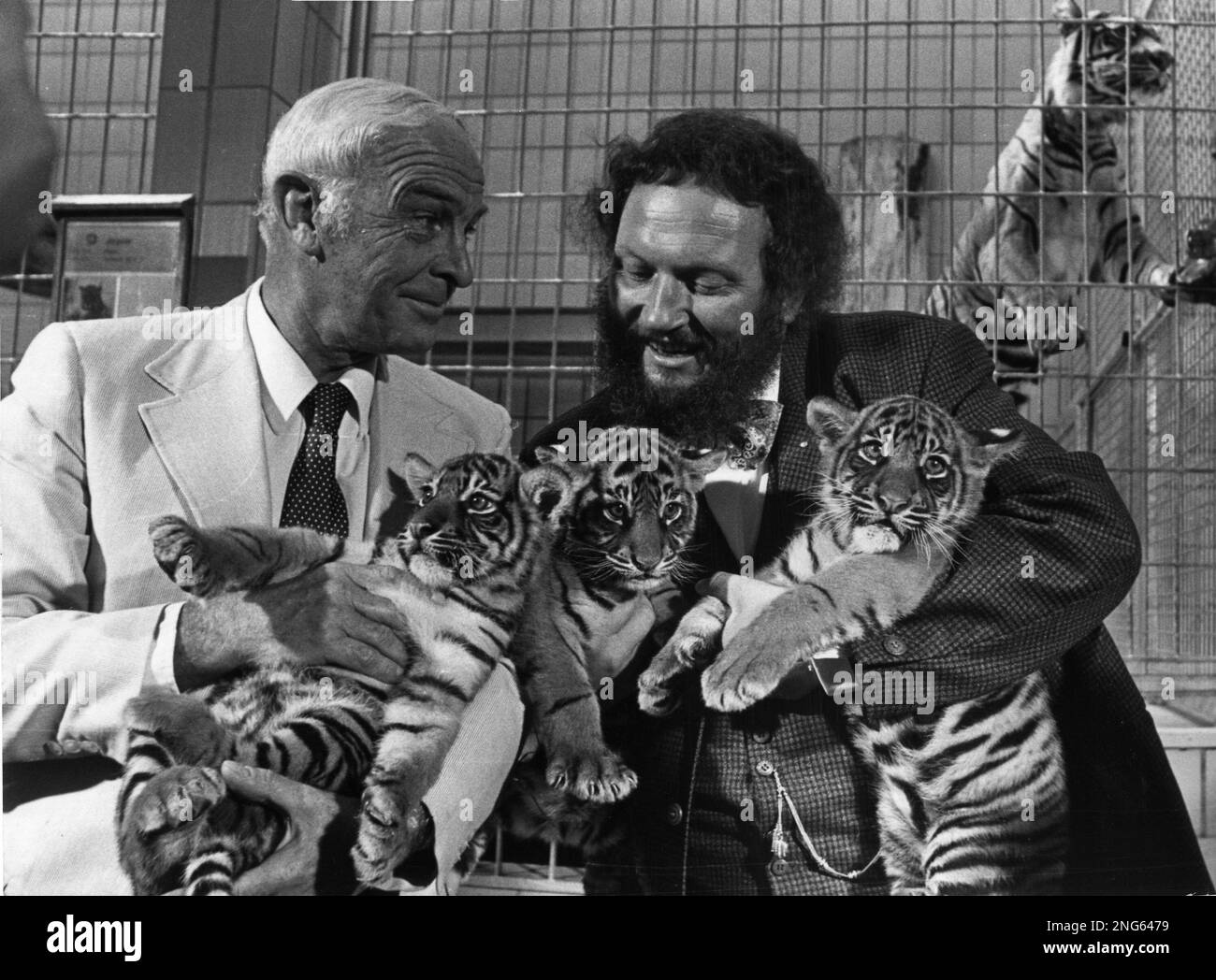 Prof. Bernhard Klemens Maria Grzimek, left, poses with singer Ivan ...