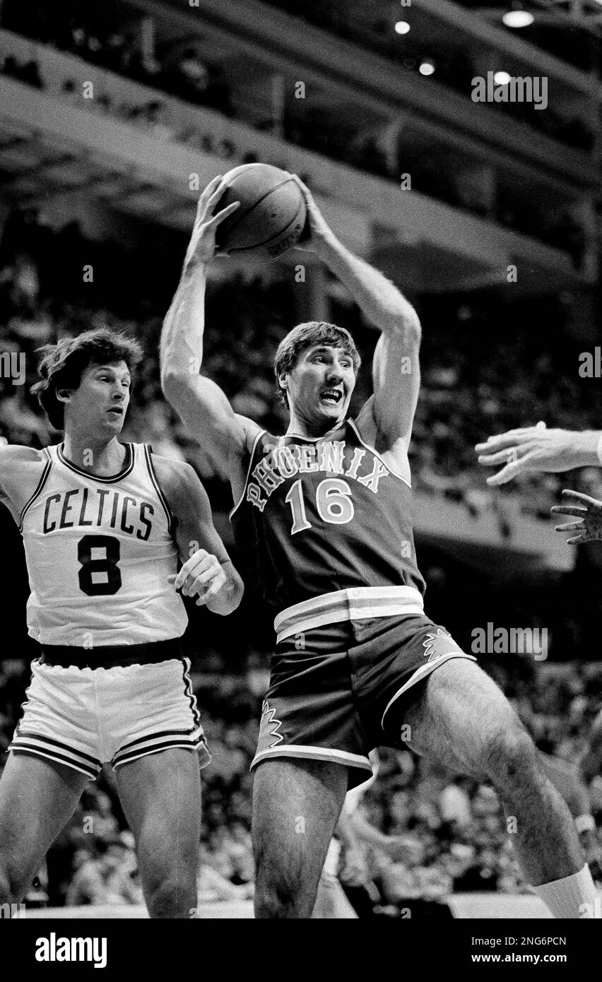 Six-foot-eight-inch Georgi Glouchkov of the Phoenix Suns pulls in a ...