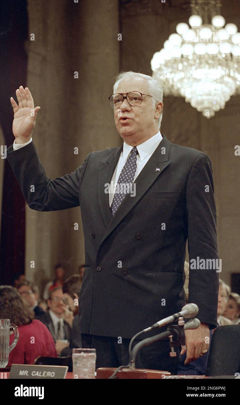 Nicaraguan rebel leader Adolfo Calero is sworn in before the ...
