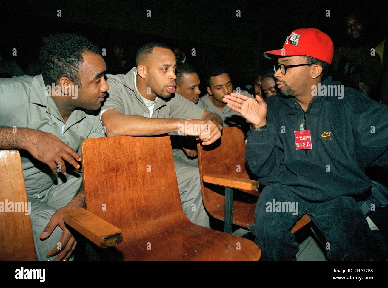 Filmmaker Spike Lee, right, speaks to Rikers Island inmates, Ivan ...