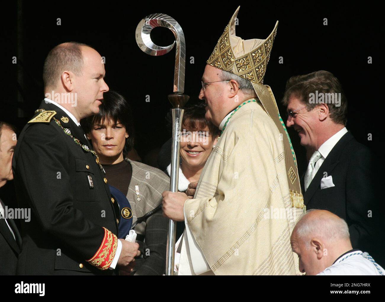 Prince Albert II of Monaco, left, speaks with archbishop.of Monaco ...