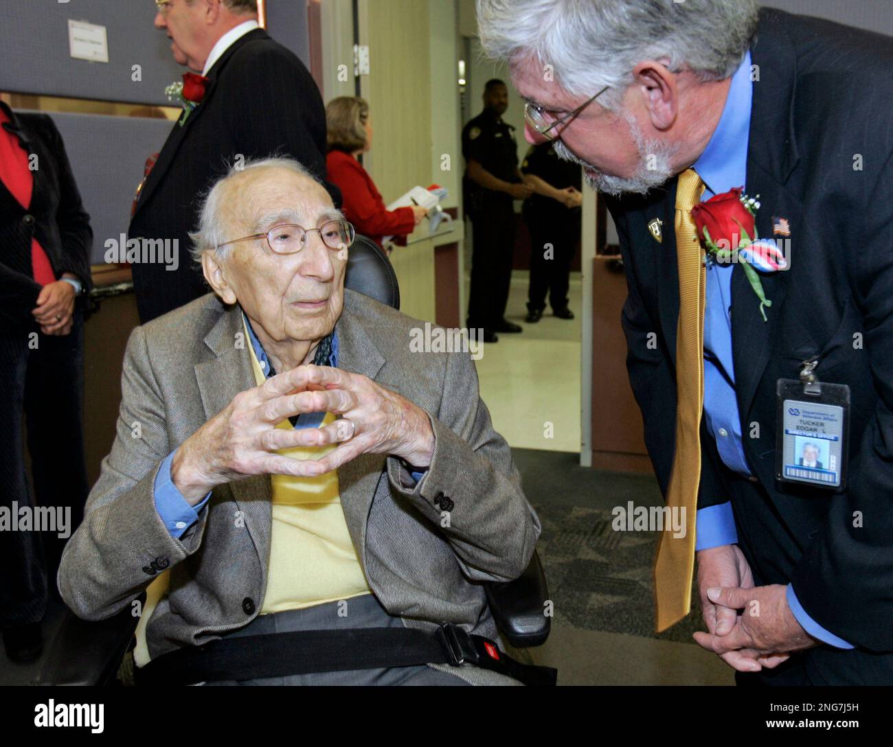 World-famous heart surgery pioneer Dr. Michael E. DeBakey, left, talks ...