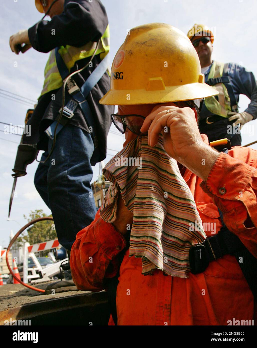 Ron Stankus, an underground technician from PSE&G, takes a break as he ...